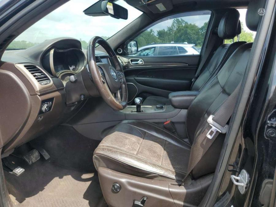 Black Jeep Grand Cherokee 2014 in Kaunas, with an engine capacity of 5.65 L and mileage of 238 thousand km for 13500 €, photo 33 on AUTOMOTO.COM.LV