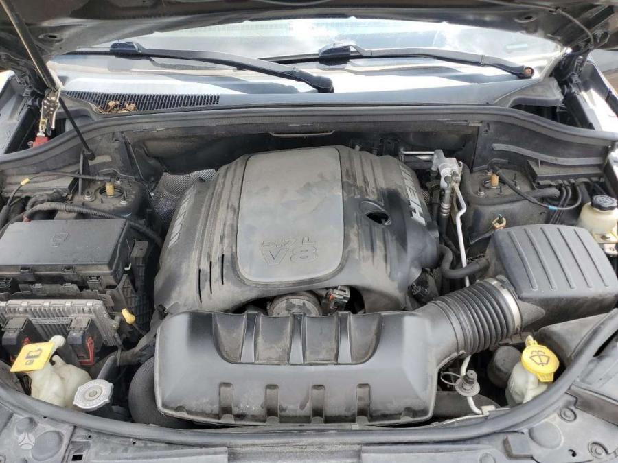 Black Jeep Grand Cherokee 2014 in Kaunas, with an engine capacity of 5.65 L and mileage of 238 thousand km for 13500 €, photo 35 on AUTOMOTO.COM.LV