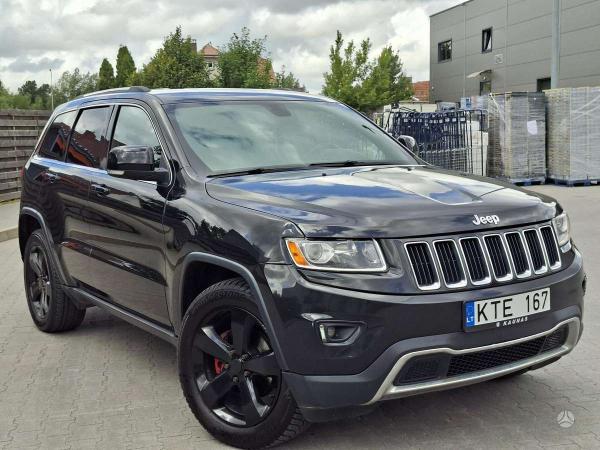 Black Jeep Grand Cherokee 2014 in Silute, with an engine capacity of 3.60 L and mileage of 297 thousand km for 9999 €, photo 1 on AUTOMOTO.COM.LV