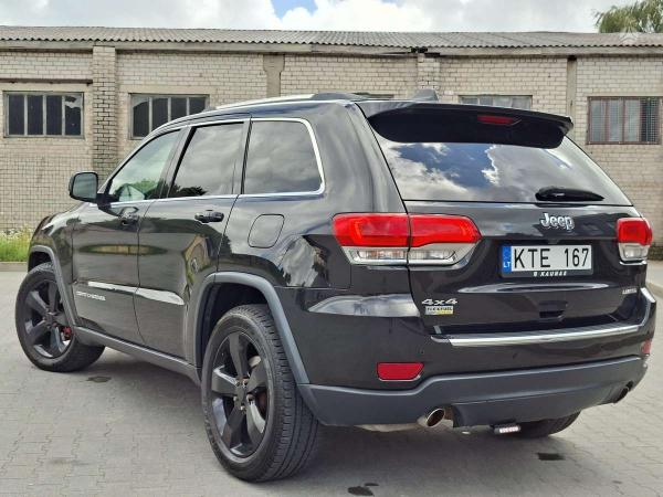 Black Jeep Grand Cherokee 2014 in Silute, with an engine capacity of 3.60 L and mileage of 297 thousand km for 9999 €, photo 4 on AUTOMOTO.COM.LV