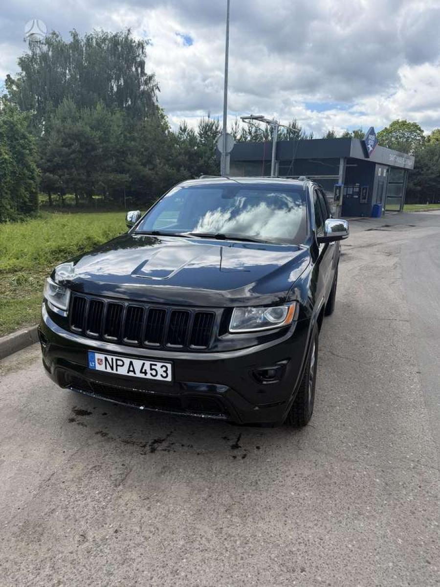Melns Jeep Grand Cherokee 2014 Prienai, ar dzinēja tilpumu 3.60 L un nobraukumu 250 tūkst. km par 11500 €, foto 1 vietnē AUTOMOTO.COM.LV