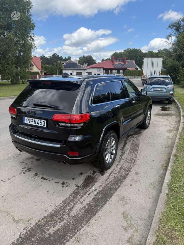 Melns Jeep Grand Cherokee 2014 Prienai, ar dzinēja tilpumu 3.60 L un nobraukumu 250 tūkst. km par 11500 €, foto 5 vietnē AUTOMOTO.COM.LV