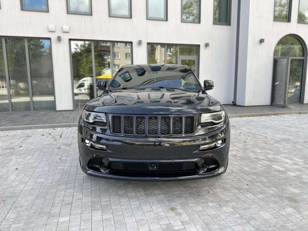 Black Jeep Grand Cherokee 2014 in Siauliai, with an engine capacity of 6.42 L and mileage of 141 thousand km for 23999 €, photo 10 on AUTOMOTO.COM.LV