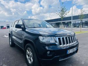 Black Jeep Grand Cherokee 2014 in Kaunas, with an engine capacity of 3.00 L and mileage of 198 thousand km for 6300 €, photo 5 on AUTOMOTO.COM.LV