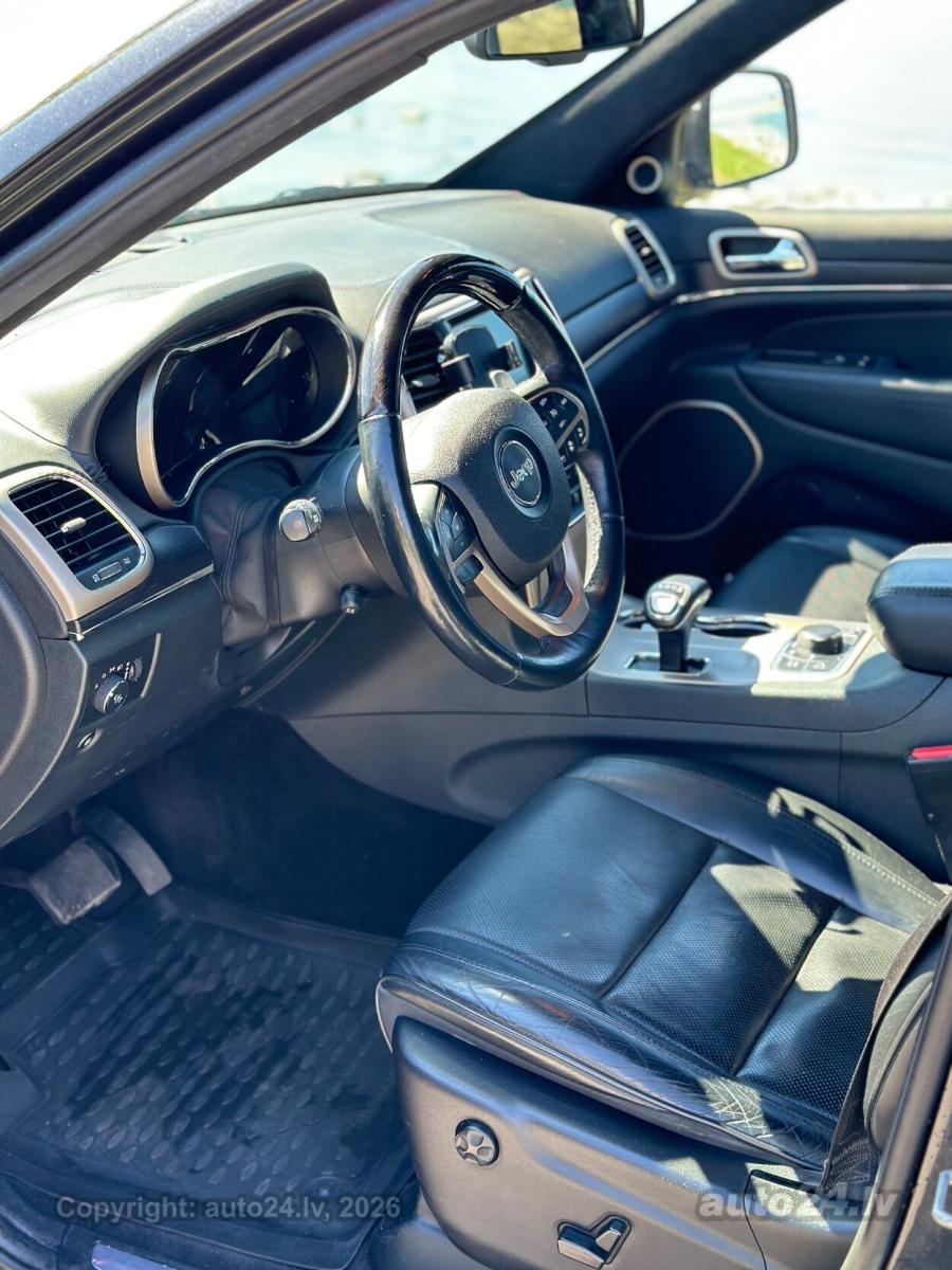 Black Jeep Grand Cherokee 2014 in Tallinn, with an engine capacity of 3.00 L and mileage of 223 thousand km for 13500 €, photo 12 on AUTOMOTO.COM.LV