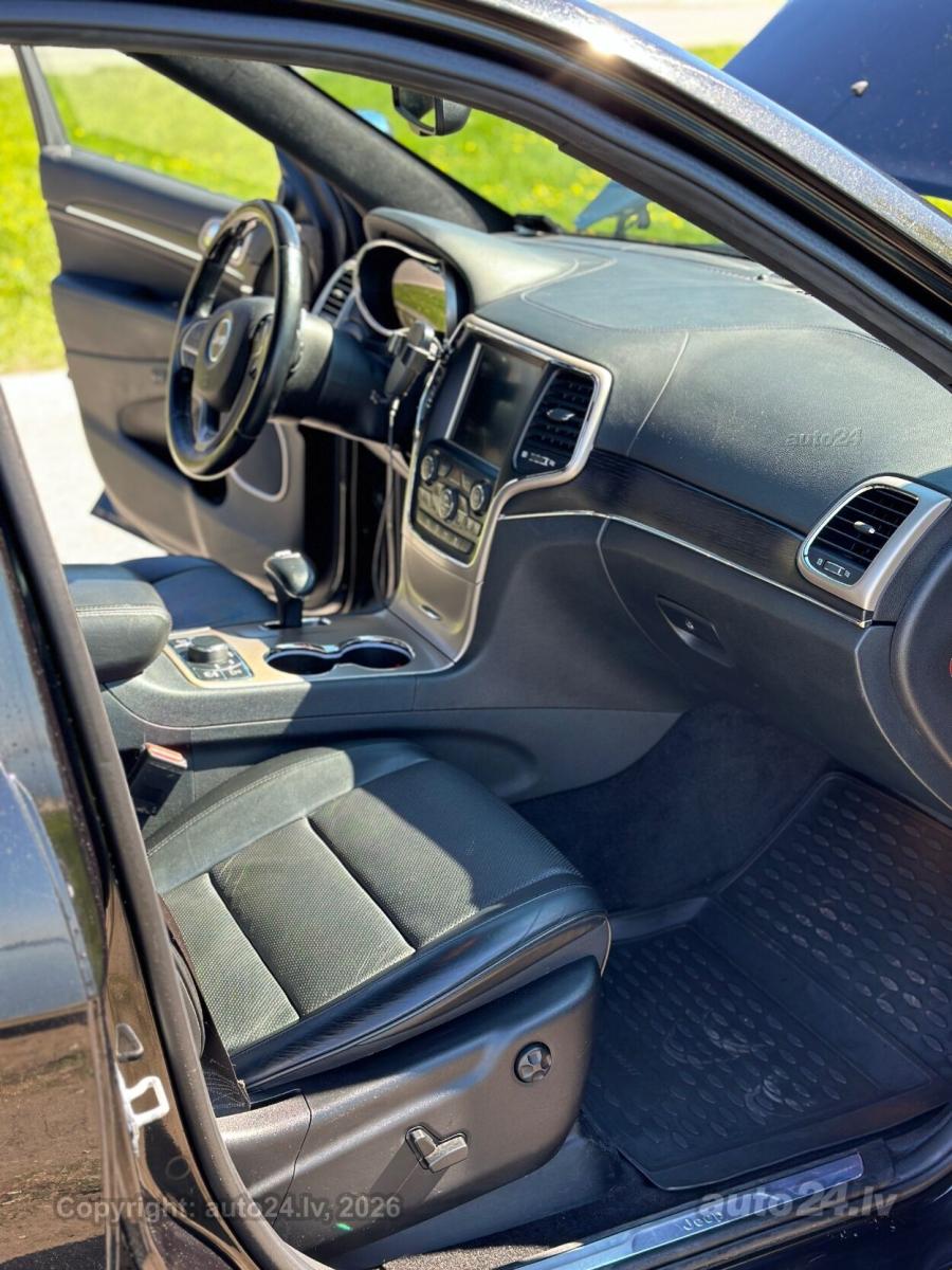 Black Jeep Grand Cherokee 2014 in Tallinn, with an engine capacity of 3.00 L and mileage of 223 thousand km for 13500 €, photo 13 on AUTOMOTO.COM.LV