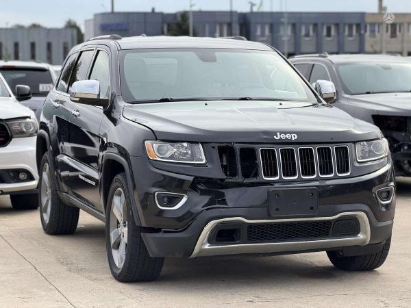 Black Jeep Grand Cherokee 2014 in Siauliai, with an engine capacity of 5.65 L and mileage of 217 thousand km for 8300 €, photo 4 on AUTOMOTO.COM.LV