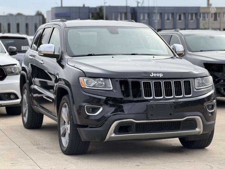 Black Jeep Grand Cherokee 2014 in Siauliai, with an engine capacity of 5.65 L and mileage of 217 thousand km for 8300 €, photo 4 on AUTOMOTO.COM.LV