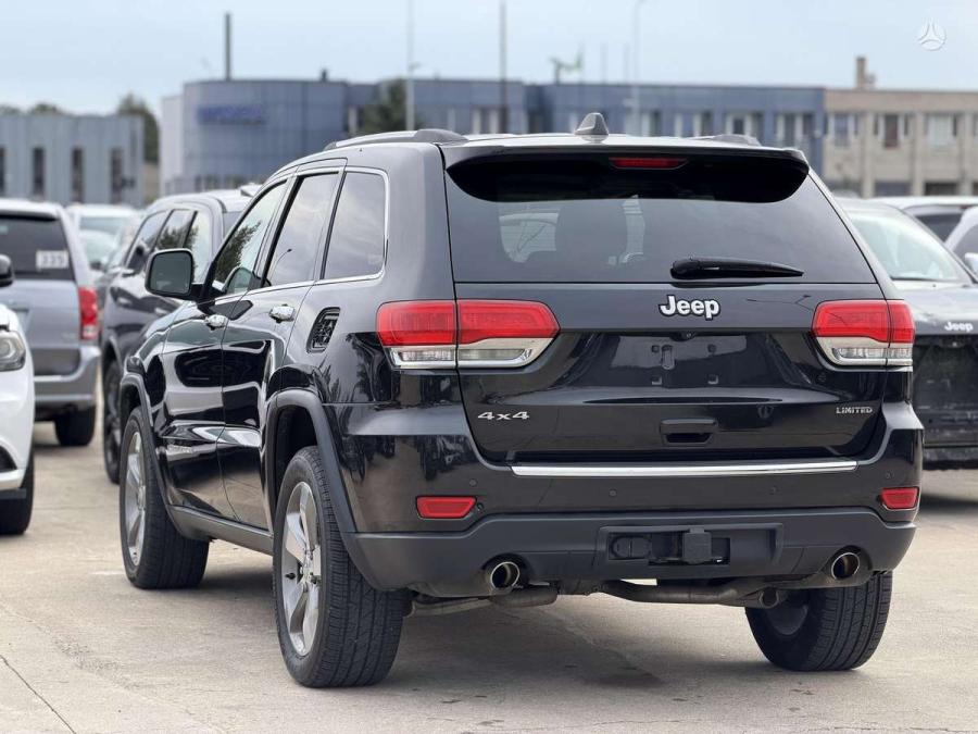 Black Jeep Grand Cherokee 2014 in Siauliai, with an engine capacity of 5.65 L and mileage of 217 thousand km for 8300 €, photo 7 on AUTOMOTO.COM.LV