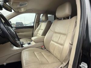 Black Jeep Grand Cherokee 2014 in Siauliai, with an engine capacity of 5.65 L and mileage of 217 thousand km for 8300 €, photo 9 on AUTOMOTO.COM.LV