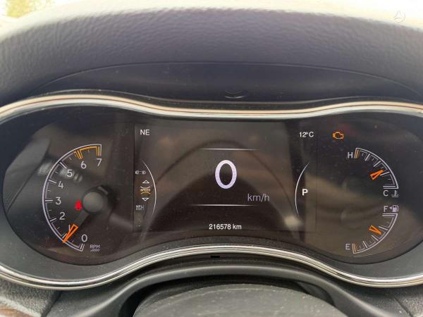 Black Jeep Grand Cherokee 2014 in Siauliai, with an engine capacity of 5.65 L and mileage of 217 thousand km for 8300 €, photo 10 on AUTOMOTO.COM.LV