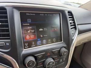 Black Jeep Grand Cherokee 2014 in Siauliai, with an engine capacity of 5.65 L and mileage of 217 thousand km for 8300 €, photo 12 on AUTOMOTO.COM.LV