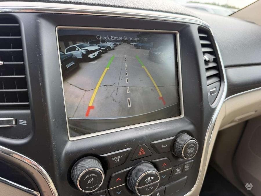Black Jeep Grand Cherokee 2014 in Siauliai, with an engine capacity of 5.65 L and mileage of 217 thousand km for 8300 €, photo 13 on AUTOMOTO.COM.LV