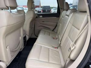 Black Jeep Grand Cherokee 2014 in Siauliai, with an engine capacity of 5.65 L and mileage of 217 thousand km for 8300 €, photo 15 on AUTOMOTO.COM.LV