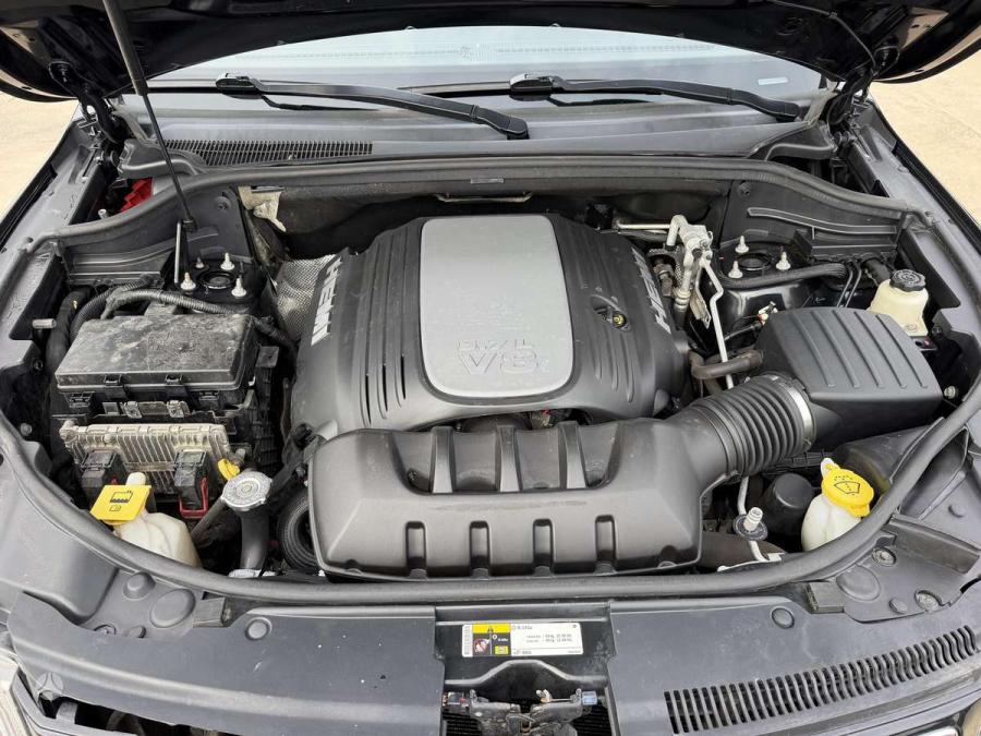 Black Jeep Grand Cherokee 2014 in Siauliai, with an engine capacity of 5.65 L and mileage of 217 thousand km for 8300 €, photo 19 on AUTOMOTO.COM.LV