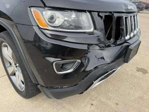 Black Jeep Grand Cherokee 2014 in Siauliai, with an engine capacity of 5.65 L and mileage of 217 thousand km for 8300 €, photo 22 on AUTOMOTO.COM.LV