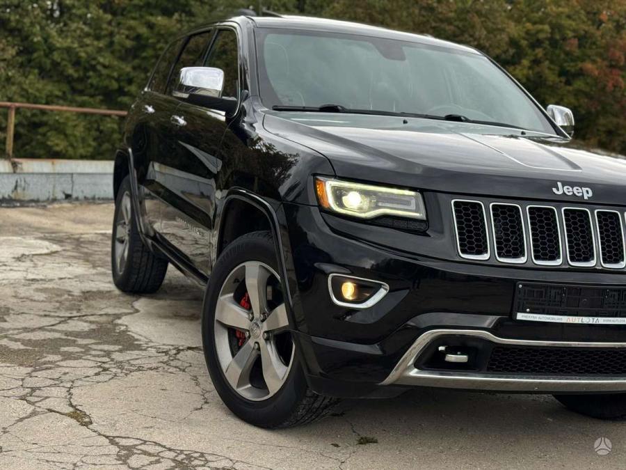 Black Jeep Grand Cherokee 2014 in Vilnius, with an engine capacity of 5.65 L and mileage of 257 thousand km for 16500 €, photo 10 on AUTOMOTO.COM.LV