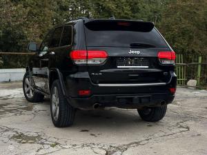 Black Jeep Grand Cherokee 2014 in Vilnius, with an engine capacity of 5.65 L and mileage of 257 thousand km for 16500 €, photo 11 on AUTOMOTO.COM.LV