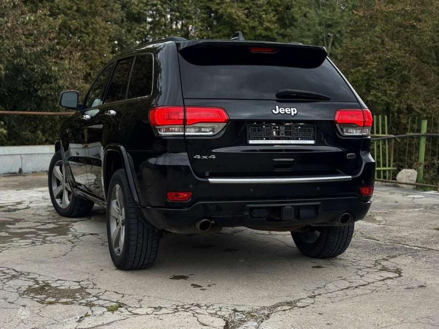 Black Jeep Grand Cherokee 2014 in Vilnius, with an engine capacity of 5.65 L and mileage of 257 thousand km for 16500 €, photo 11 on AUTOMOTO.COM.LV