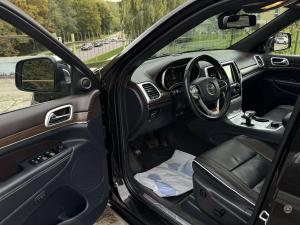 Black Jeep Grand Cherokee 2014 in Vilnius, with an engine capacity of 5.65 L and mileage of 257 thousand km for 16500 €, photo 21 on AUTOMOTO.COM.LV