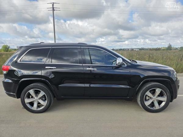Джип Гранд Чероки 2014 в Шяуляй на AUTOMOTO.COM.LV Черный Джип Гранд Чероки 2014 в Шяуляй, объемом двигателя 3.60 л и пробегом 245 тыс. км за 14900 €, фото 8 на AUTOMOTO.COM.LV
