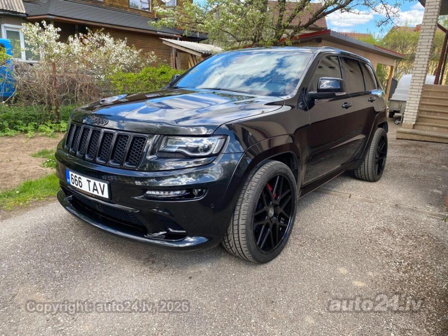 Black Jeep Grand Cherokee 2015 in Tartu, with an engine capacity of 6.40 L and mileage of 130 thousand km for 26500 €, photo 1 on AUTOMOTO.COM.LV