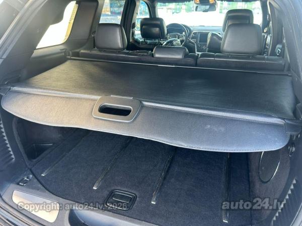 Melns Jeep Grand Cherokee 2015 Tartu, ar dzinēja tilpumu 6.40 L un nobraukumu 130 tūkst. km par 26500 €, foto 11 vietnē AUTOMOTO.COM.LV