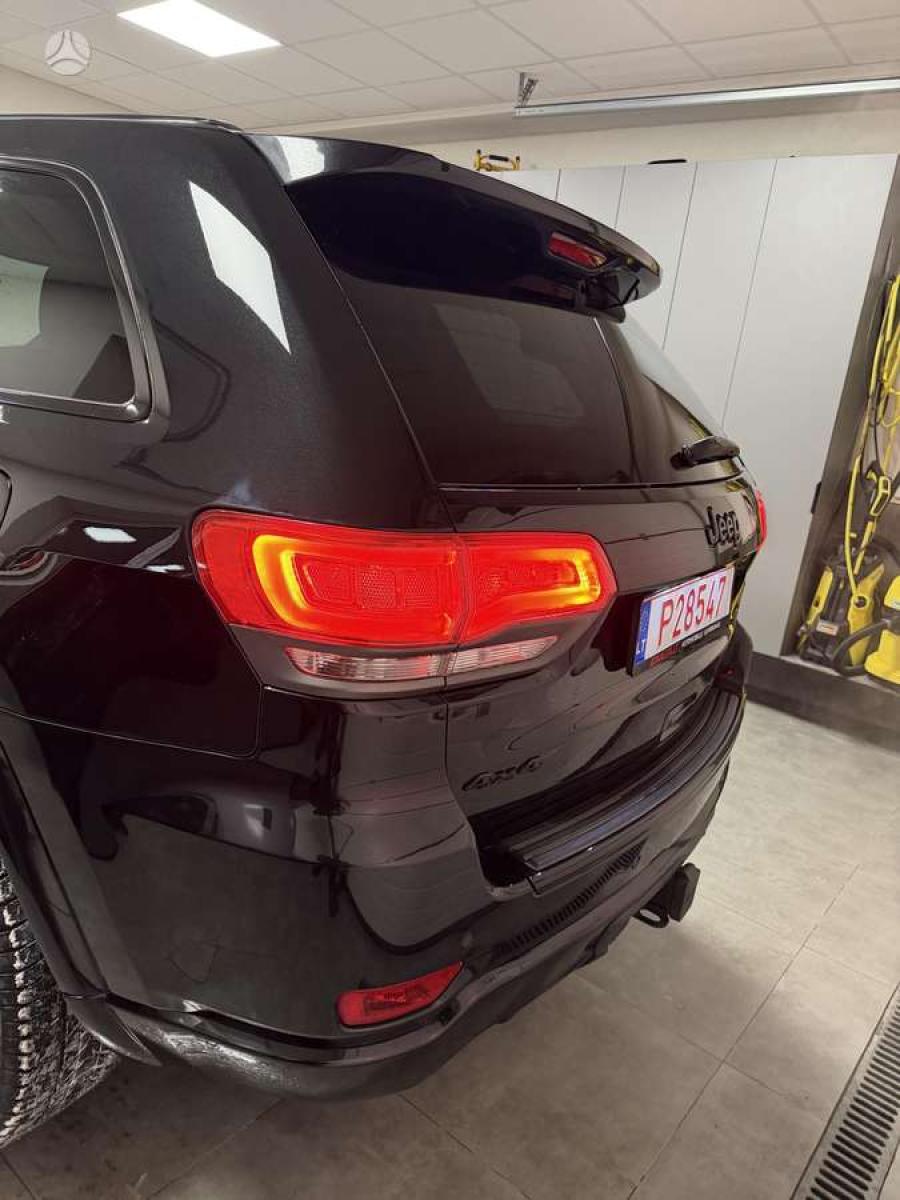 Black Jeep Grand Cherokee 2015 in Siauliai, with an engine capacity of 3.60 L and mileage of 265 thousand km for 13300 €, photo 5 on AUTOMOTO.COM.LV