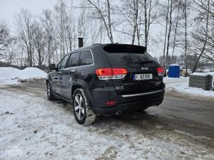 Black Jeep Grand Cherokee 2015 in Marijampole, with an engine capacity of 3.00 L and mileage of 14 thousand km for 16400 €, photo 2 on AUTOMOTO.COM.LV
