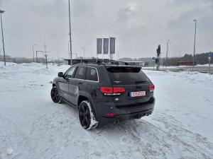 Melns Jeep Grand Cherokee 2015 Viļņa, ar dzinēja tilpumu 3.60 L un nobraukumu 308 tūkst. km par 12799 €, foto  vietnē AUTOMOTO.COM.LV