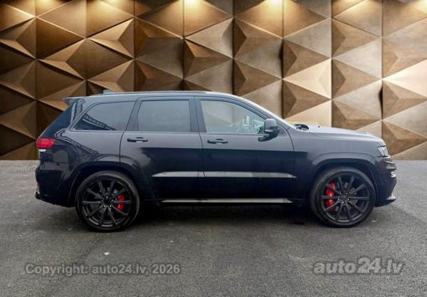 Black Jeep Grand Cherokee 2015 in Tallinn, with an engine capacity of 6.40 L and mileage of 162 thousand km for 28990 €, photo 4 on AUTOMOTO.COM.LV