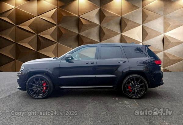 Black Jeep Grand Cherokee 2015 in Tallinn, with an engine capacity of 6.40 L and mileage of 162 thousand km for 28990 €, photo 5 on AUTOMOTO.COM.LV