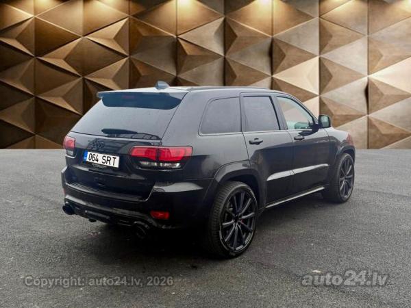 Black Jeep Grand Cherokee 2015 in Tallinn, with an engine capacity of 6.40 L and mileage of 162 thousand km for 28990 €, photo 6 on AUTOMOTO.COM.LV