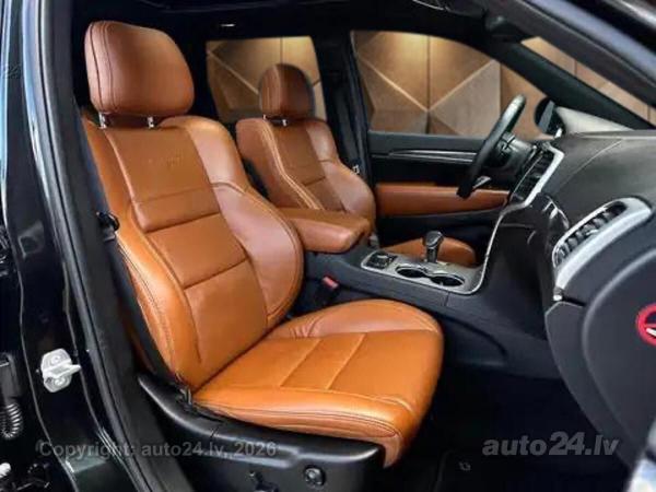 Black Jeep Grand Cherokee 2015 in Tallinn, with an engine capacity of 6.40 L and mileage of 162 thousand km for 28990 €, photo 11 on AUTOMOTO.COM.LV