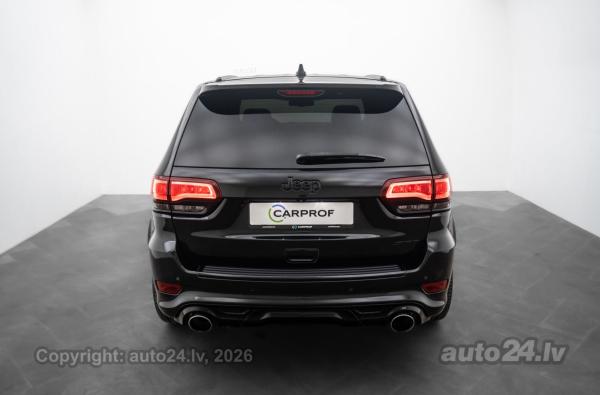 Black Jeep Grand Cherokee 2015 in Tallinn, with an engine capacity of 6.40 L and mileage of 203 thousand km for 22999 €, photo 5 on AUTOMOTO.COM.LV