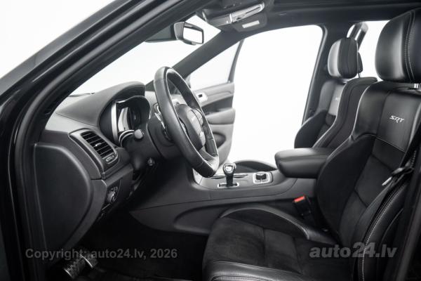 Black Jeep Grand Cherokee 2015 in Tallinn, with an engine capacity of 6.40 L and mileage of 203 thousand km for 22999 €, photo 7 on AUTOMOTO.COM.LV