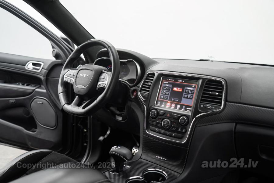 Melns Jeep Grand Cherokee 2015 Tallina, ar dzinēja tilpumu 6.40 L un nobraukumu 203 tūkst. km par 22999 €, foto 12 vietnē AUTOMOTO.COM.LV