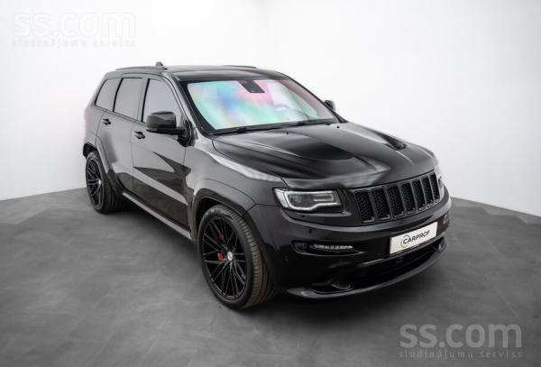 Black Jeep Grand Cherokee 2015 in Riga, with an engine capacity of 6.40 L and mileage of 203 thousand km for 22999 €, photo 3 on AUTOMOTO.COM.LV
