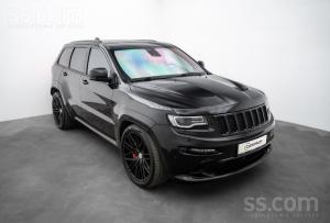 Melns Jeep Grand Cherokee 2015 Rīga, ar dzinēja tilpumu 6.40 L un nobraukumu 203 tūkst. km par 22999 €, foto 4 vietnē AUTOMOTO.COM.LV