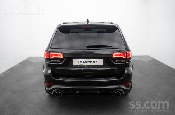 Black Jeep Grand Cherokee 2015 in Riga, with an engine capacity of 6.40 L and mileage of 203 thousand km for 22999 €, photo 5 on AUTOMOTO.COM.LV