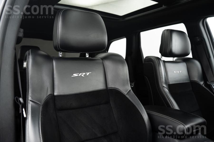 Melns Jeep Grand Cherokee 2015 Rīga, ar dzinēja tilpumu 6.40 L un nobraukumu 203 tūkst. km par 22999 €, foto 14 vietnē AUTOMOTO.COM.LV