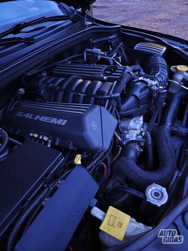 Black Jeep Grand Cherokee 2015 in Kaunas, with an engine capacity of 6.40 L and mileage of 170 thousand km for 24000 €, photo 2 on AUTOMOTO.COM.LV