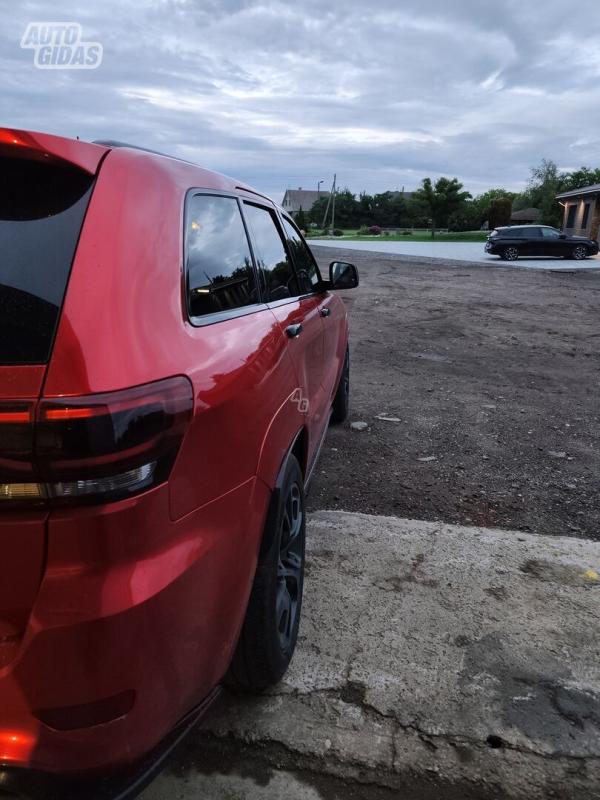 Black Jeep Grand Cherokee 2015 in Kaunas, with an engine capacity of 6.40 L and mileage of 170 thousand km for 24000 €, photo 5 on AUTOMOTO.COM.LV