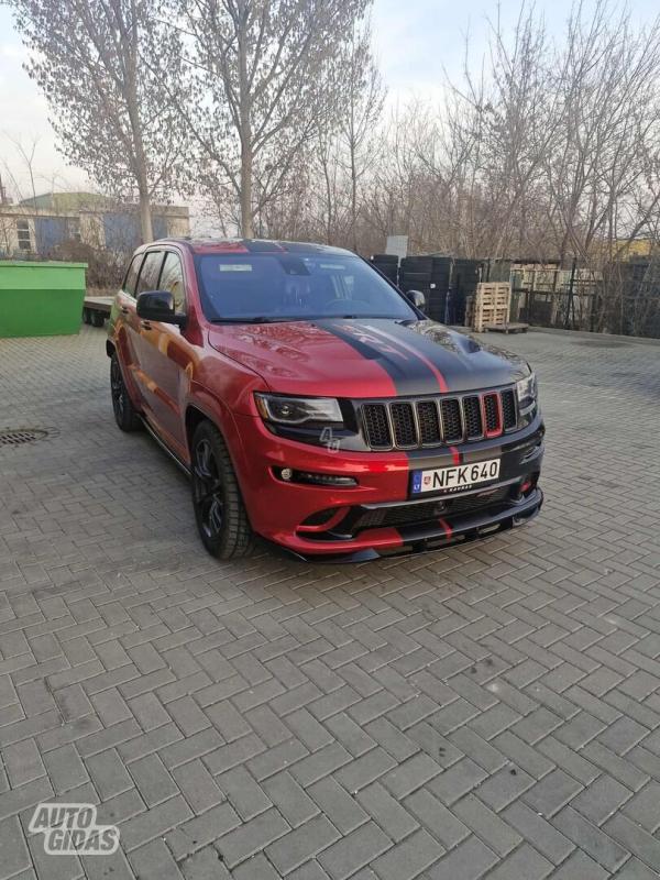 Black Jeep Grand Cherokee 2015 in Kaunas, with an engine capacity of 6.40 L and mileage of 170 thousand km for 24000 €, photo 9 on AUTOMOTO.COM.LV