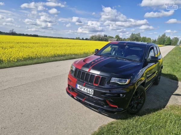 Black Jeep Grand Cherokee 2015 in Kaunas, with an engine capacity of 6.40 L and mileage of 170 thousand km for 24000 €, photo 10 on AUTOMOTO.COM.LV