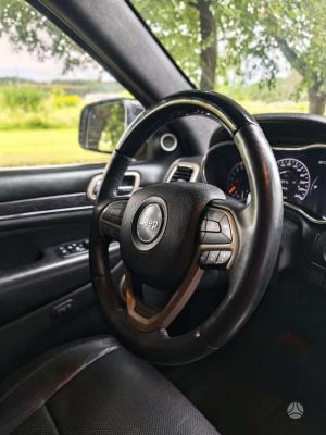 Melns Jeep Grand Cherokee 2015 Viļņa, ar dzinēja tilpumu 5.70 L un nobraukumu 156 tūkst. km par 20500 €, foto 15 vietnē AUTOMOTO.COM.LV