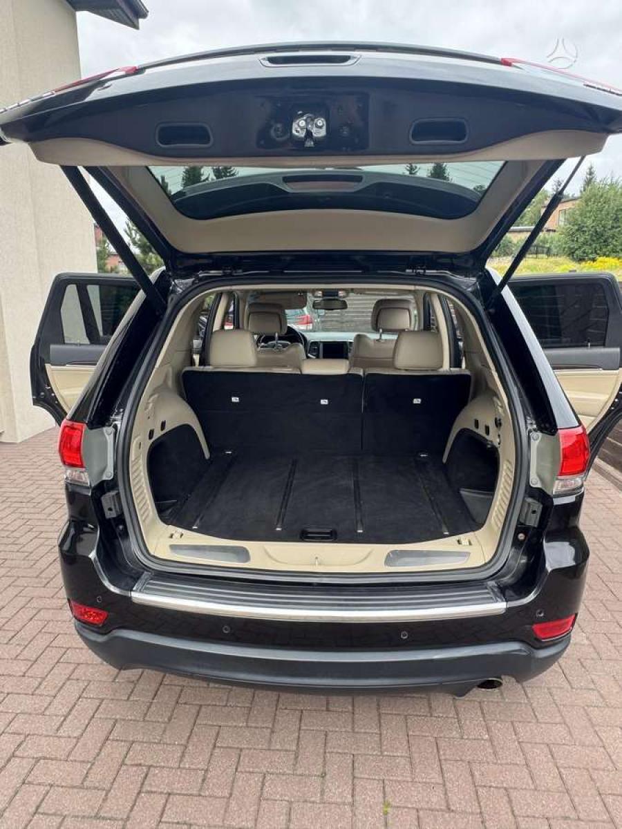 Black Jeep Grand Cherokee 2015 in Vilnius, with an engine capacity of 3.60 L and mileage of 285 thousand km for 11900 €, photo 13 on AUTOMOTO.COM.LV