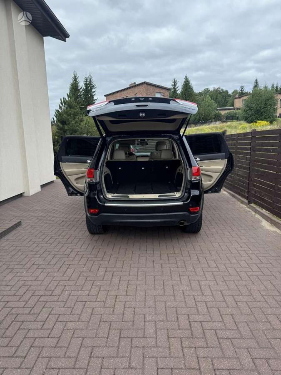 Black Jeep Grand Cherokee 2015 in Vilnius, with an engine capacity of 3.60 L and mileage of 285 thousand km for 11900 €, photo 14 on AUTOMOTO.COM.LV