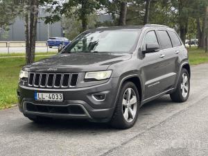 Black Jeep Grand Cherokee 2015 in Riga, with an engine capacity of 3.00 L and mileage of 291 thousand km for 11300 €, photo  on AUTOMOTO.COM.LV