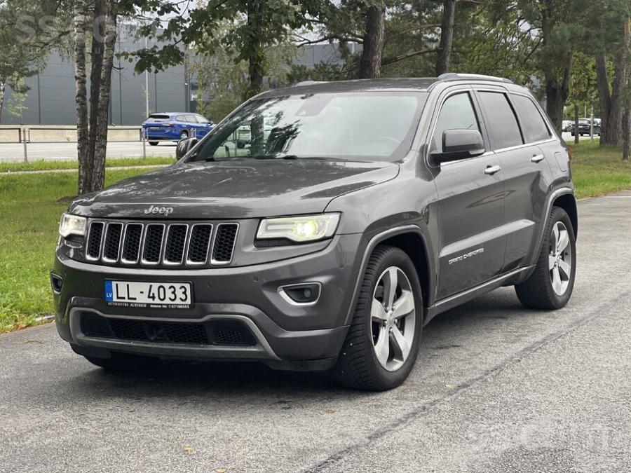 Black Jeep Grand Cherokee 2015 in Riga, with an engine capacity of 3.00 L and mileage of 291 thousand km for 11300 €, photo 1 on AUTOMOTO.COM.LV